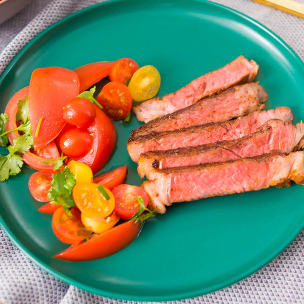 Braai-Rubbed Ribeyes with Tomato Salad - Basbaas Foods